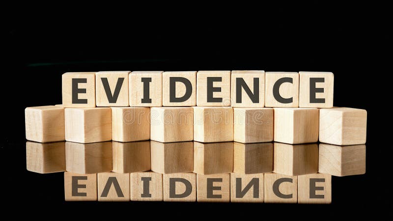 EVIDENCE Text Assembled from Wooden Cubes on a Black Background Stock ...