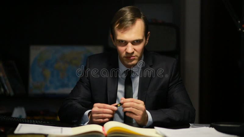 Evil Business Man, Official, Looking Menacingly into the Camera while ...