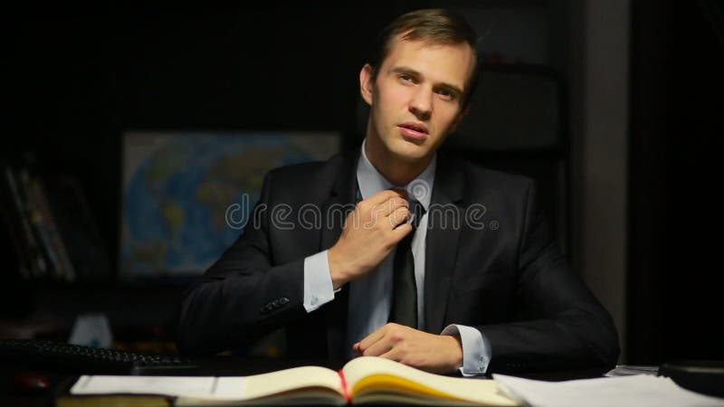 Evil Business Man, Official, Looking Menacingly into the Camera while ...