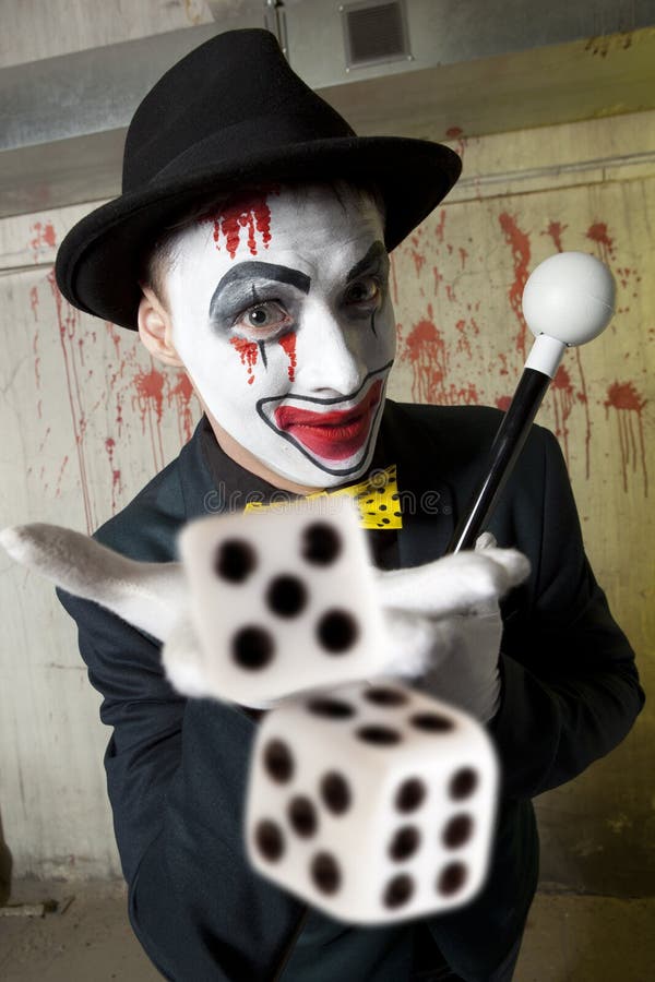 Evil Clown Playing with Dice Stock Photo - Image of holiday, people ...
