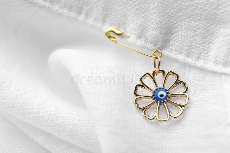 Evil Eye Safety Pin on Clothing, Closeup Stock Photo - Image of good ...