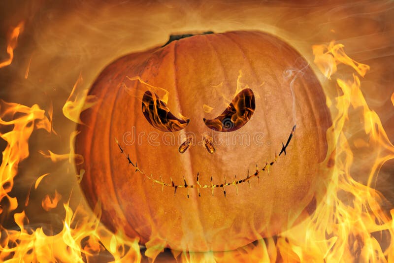 Evil Halloween Pumpkin with Fire, Smoke and Flames Stock Photo - Image ...
