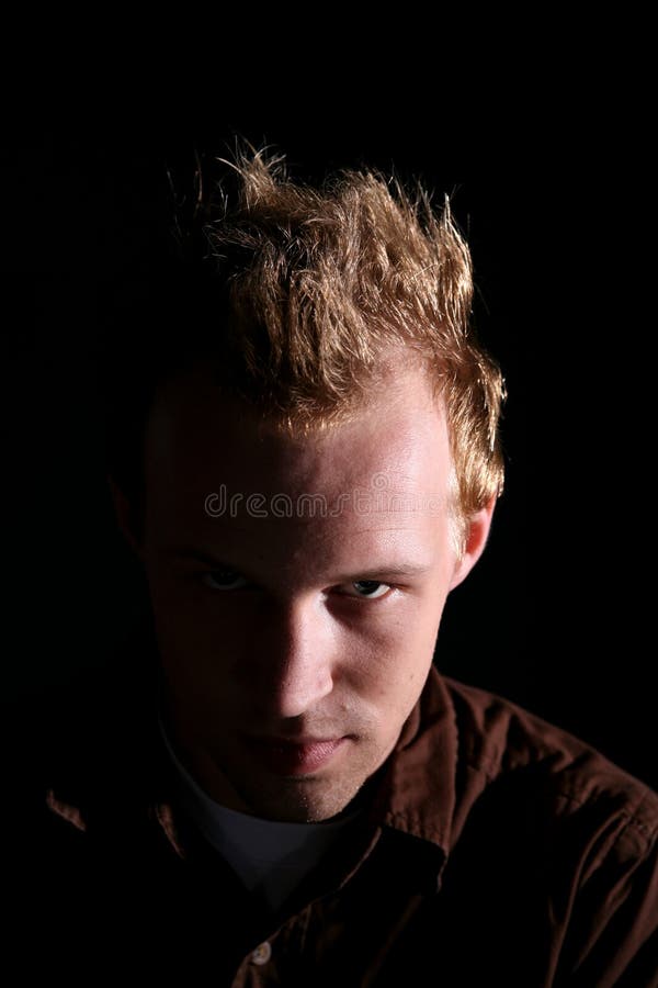 Evil Looking Man with Half Face in Shadow Stock Photo - Image of scare ...