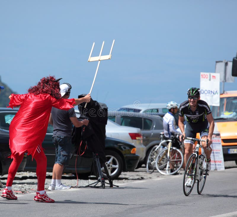 Evil Mascot Waiting for the Cyclist Editorial Stock Photo - Image of ...