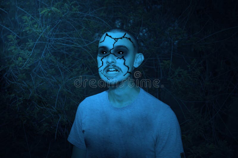 An Evil Monster with Sharp Fangs Black Eyes and Scars in the Wilderness ...