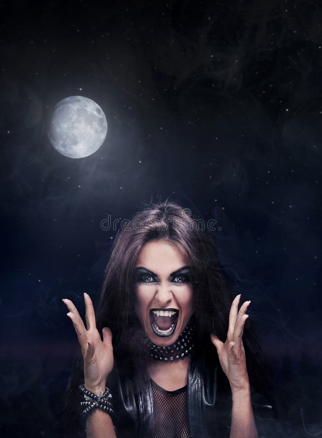 Evil rock-star woman stock photo. Image of hand, fear - 13528112