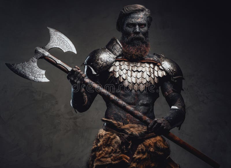 Evil Soldier with Scorched Skin Standing and Holding His Axe Stock ...