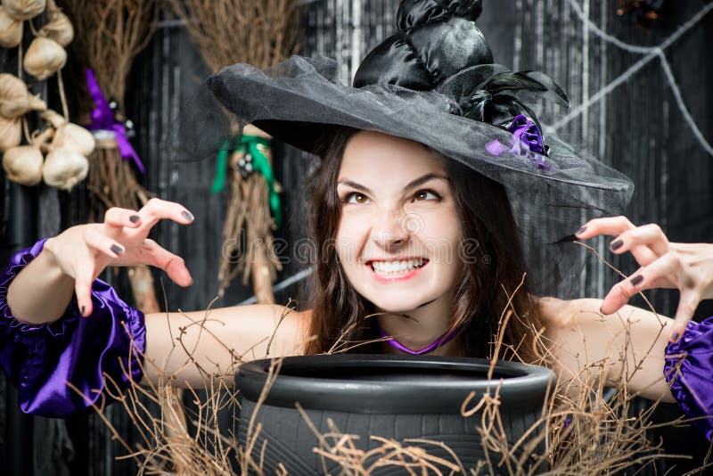 An Evil Young Witch with a Pot, in Which he Cooks Stock Image - Image ...