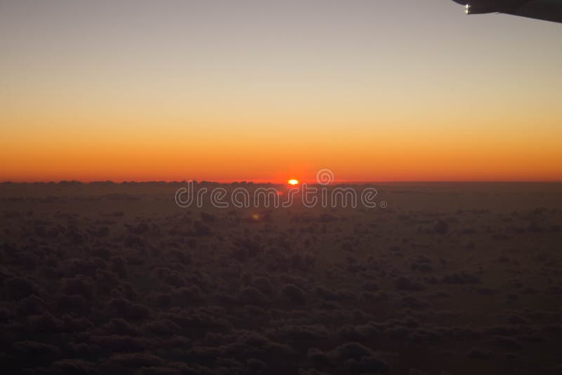 Sunrise from the Plane Flying with the Sun Rising on the Horizon Stock ...