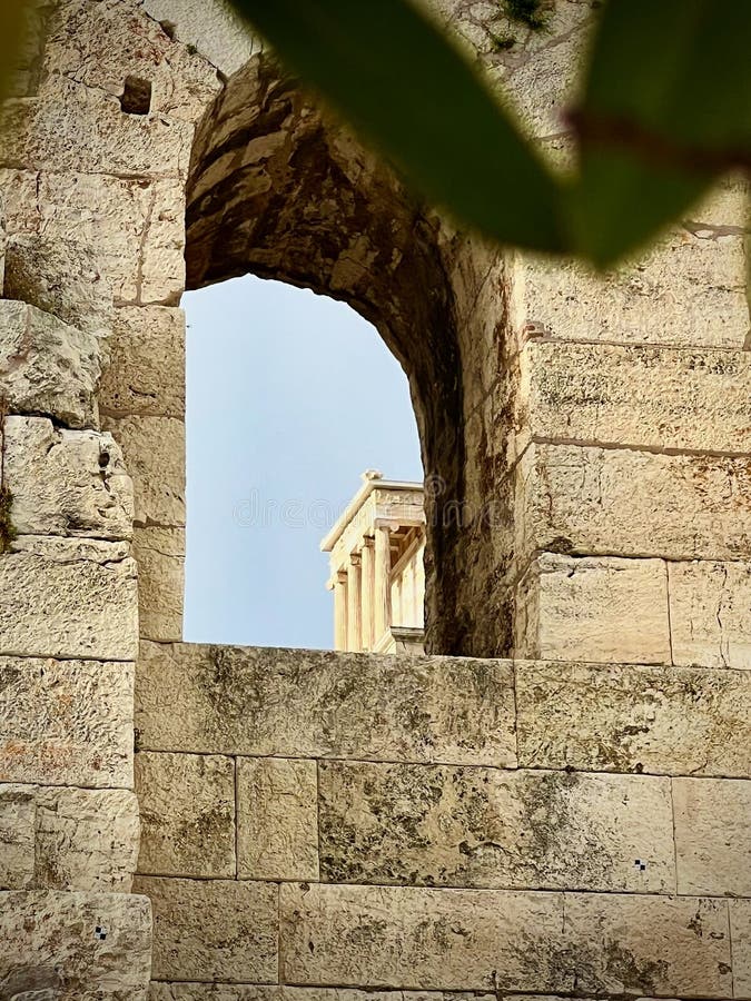Historic Archway Framing a Glimpse of Classical Athens Architecture ...