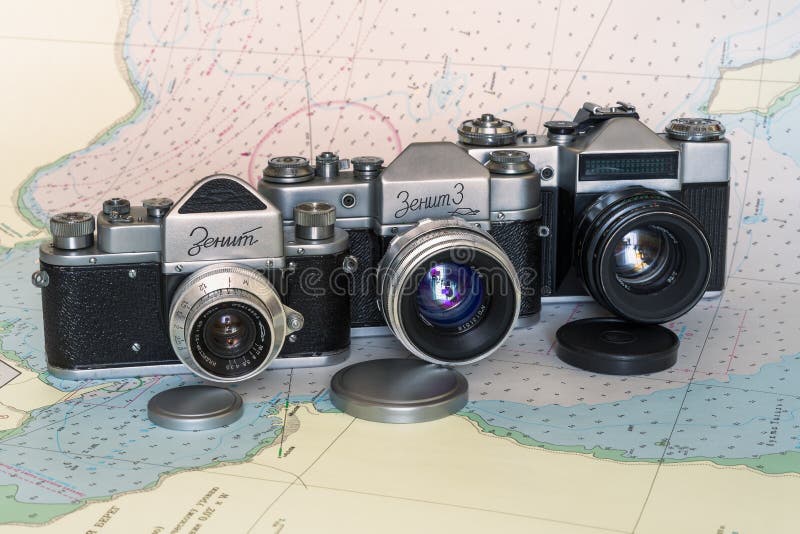 The Evolution of Old Cameras. Photographed with a Marine Geographic Map ...