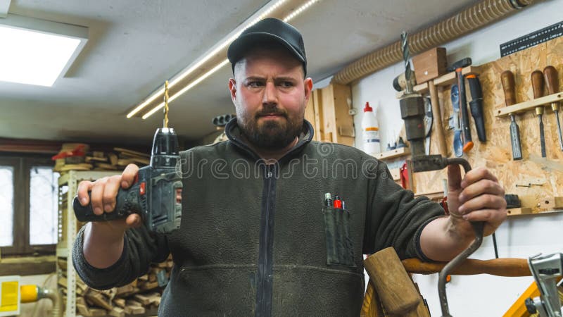 Evolution of Woodworking. Male Carpenter Holding Electrical and Non ...