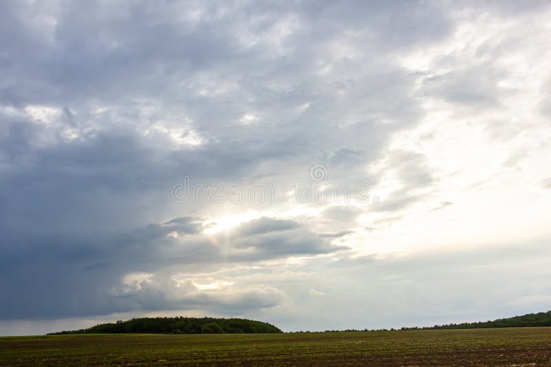 Evolving Weather Patterns Above a Rural Landscape Under Dramatic Skies ...