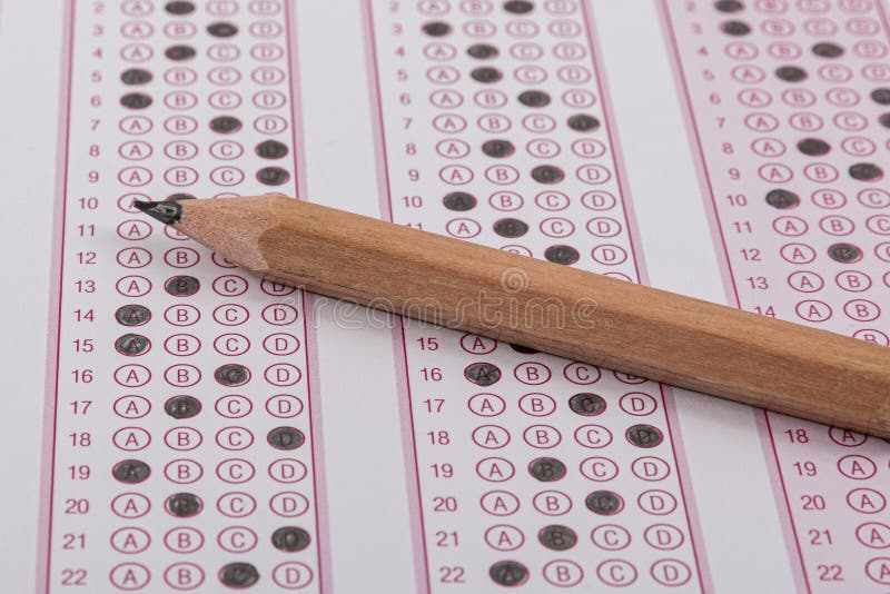 Exam, a Hand Taking an Exam with a Pen on an Optical Reader. Exam, an ...