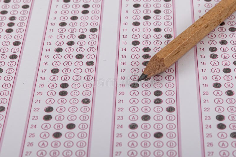 Exam, a Hand Taking an Exam with a Pen on an Optical Reader. Exam, an ...