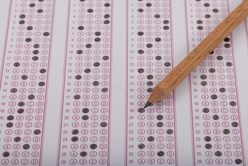 Exam, a Hand Taking an Exam with a Pen on an Optical Reader. Exam, an ...