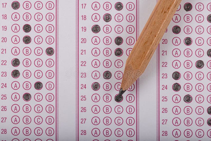 Exam, a Hand Taking an Exam with a Pen on an Optical Reader. Exam, an ...