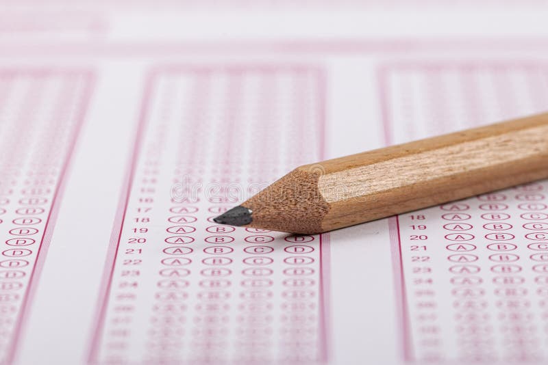 Exam, a Hand Taking an Exam with a Pen on an Optical Reader. Exam, an ...