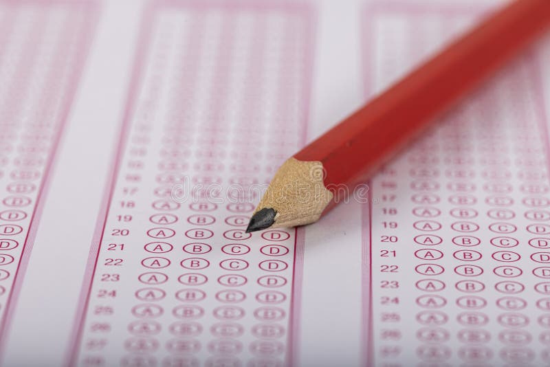Exam, a Hand Taking an Exam with a Pen on an Optical Reader. Exam, an ...