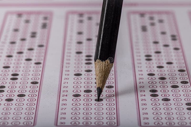 Exam, a Hand Taking an Exam with a Pen on an Optical Reader. Exam, an ...