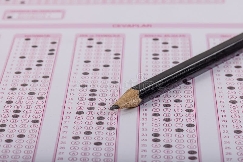 Exam, a Hand Taking an Exam with a Pen on an Optical Reader. Exam, an ...