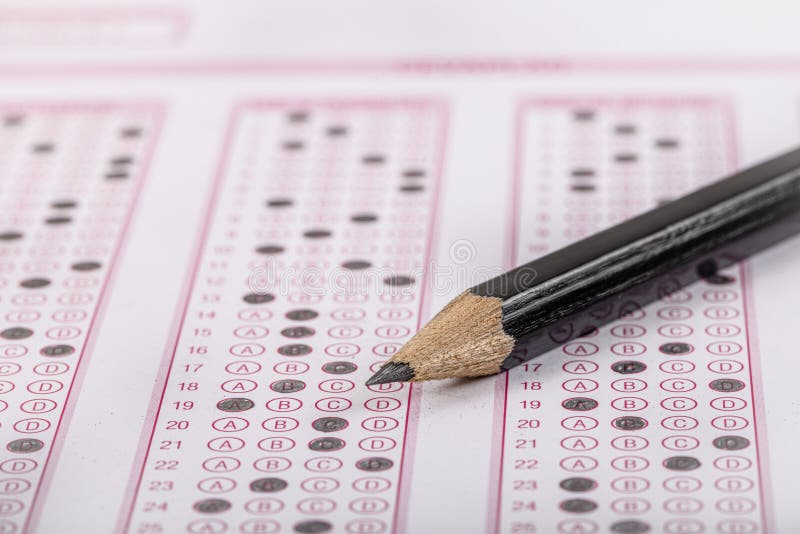 Exam, a Hand Taking an Exam with a Pen on an Optical Reader. Exam, an ...