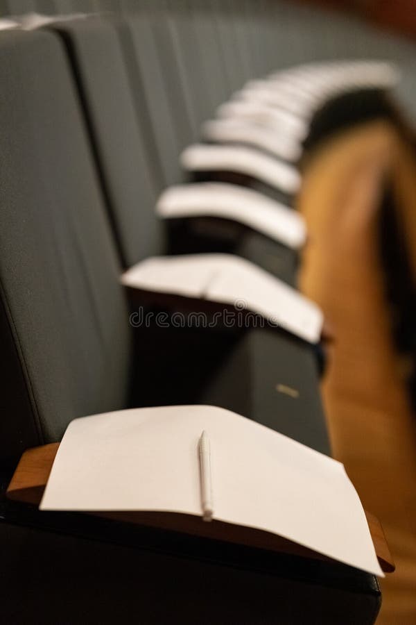 Exam Paper Sheet Tests with Pen on Seats. University Concept Stock ...