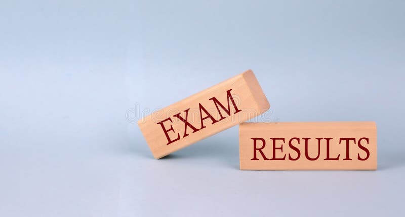 EXAM RESULTS Text on the Wooden Block, Blue Background Stock Photo ...