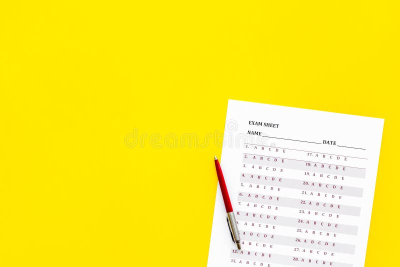 Exam Sheet on Yellow Table Flat Lay Copy Space. Education Concept Stock ...