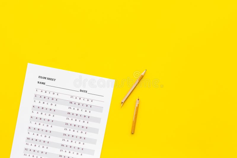 Exam Sheet on Yellow Table Flat Lay Space for Text. Education Concept ...