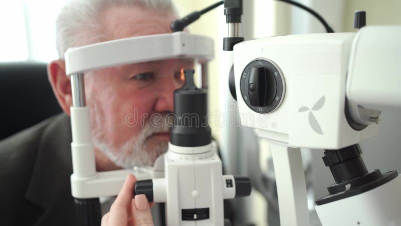 Examination of Elderly Man with Slit Lamp. Equipping Ophthalmologist S ...