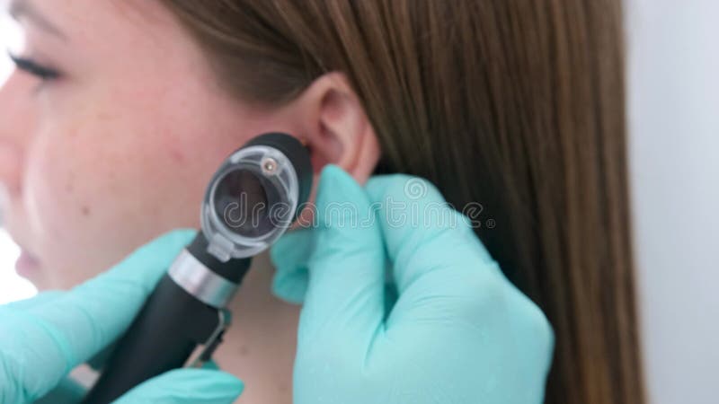 Examination by a Surdologist of the Outer Ear, the Auditory Canal Using ...