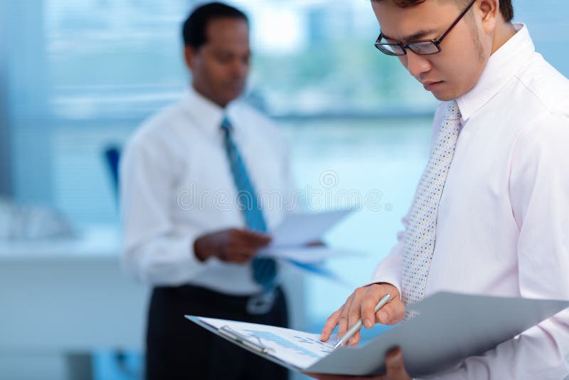 Examining document stock photo. Image of reading, concentrating - 53233706