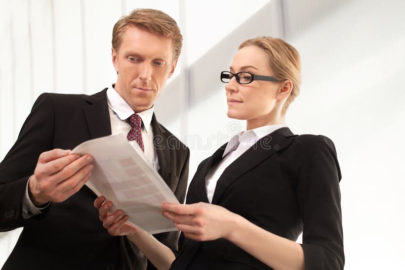 Examining a report. stock image. Image of people, communication - 36712785