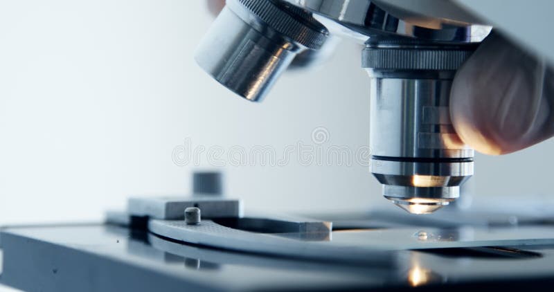 Close Up of Examining of Test Sample of Microchip Transistor Under the ...