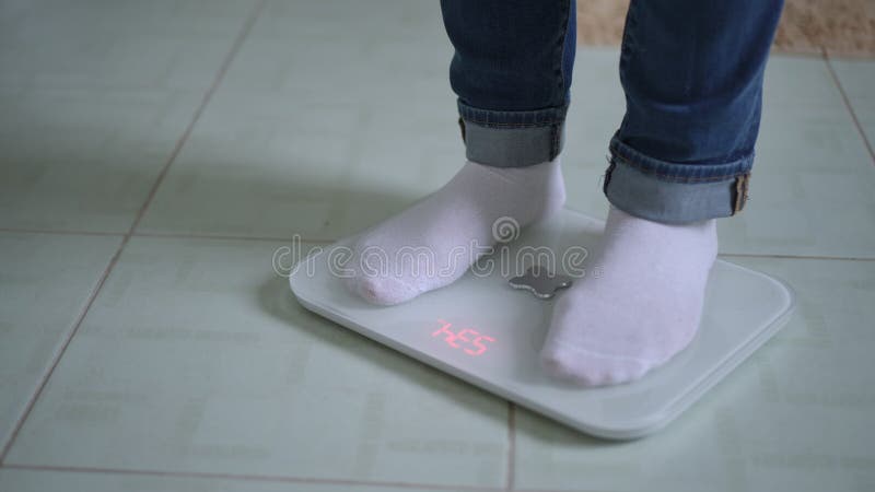 Examining Your Weight an in Depth Look at a Digital Scale during Its ...