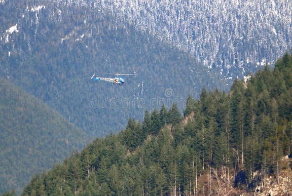 Difficult Changing Terrain and Helicopter Stock Image - Image of hard ...