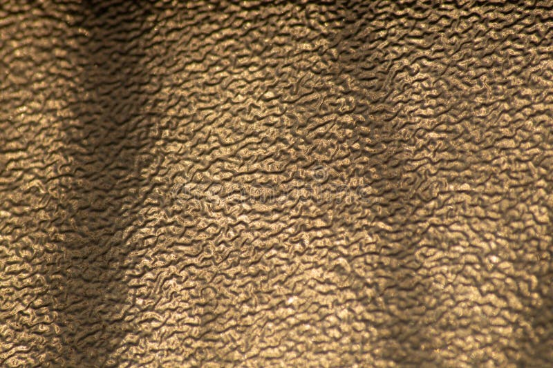 An Example of the Surface of Embossed Glass Under Natural Sunlight. a ...