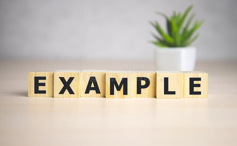 EXAMPLE Word Written on Wooden Blocks on Wooden Table. Concept for Your ...