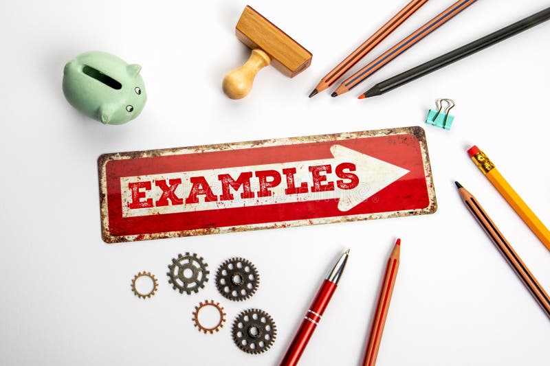 Examples. Red Direction Arrow with Text on White Office Desk Stock ...