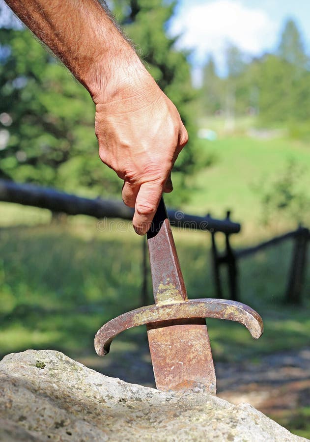 Excalibur Sword and the Hand of Arthur Stock Photo - Image of ...
