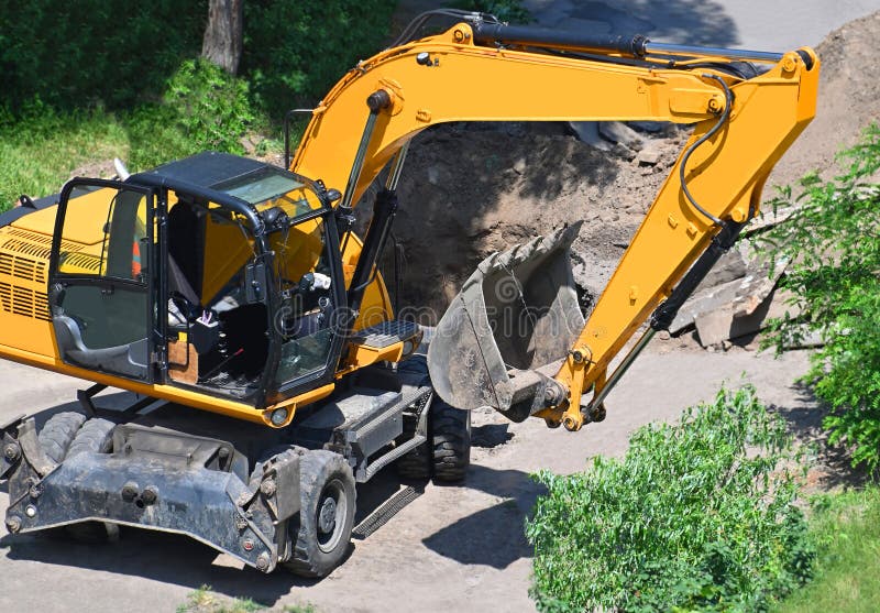 Excavating Machine on Construction Site Stock Image - Image of metallic ...