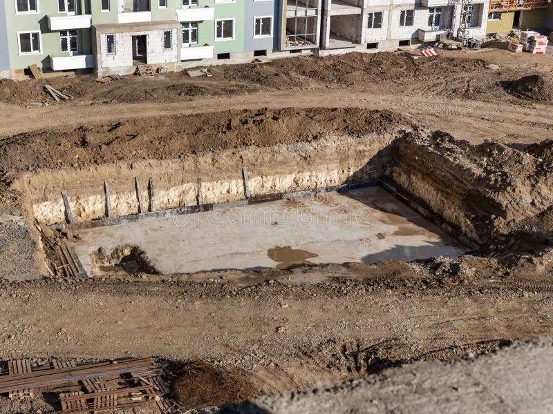 Excavation for a Pool in the Courtyard of a High-rise Building Under ...