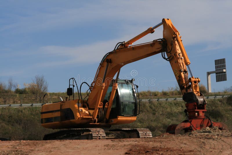 Large Backhoe stock image. Image of clouds, equipment - 1097701