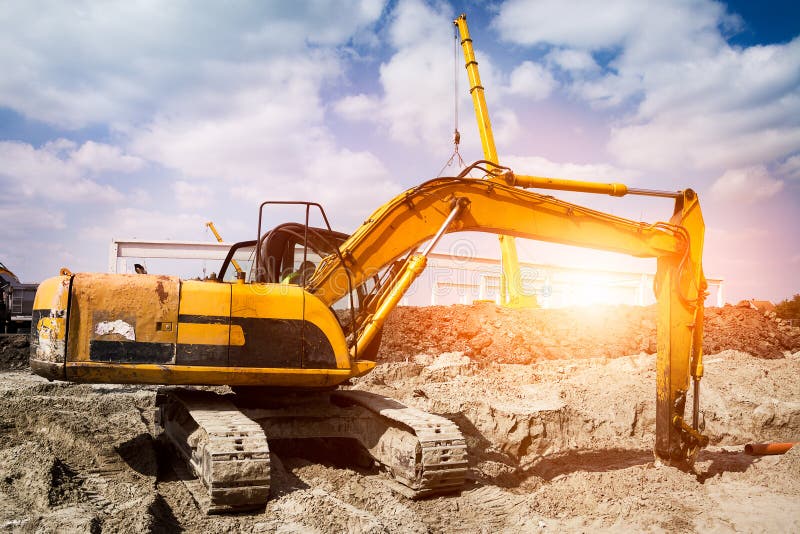 Excavator in action stock photo. Image of industry, engineering - 62185720