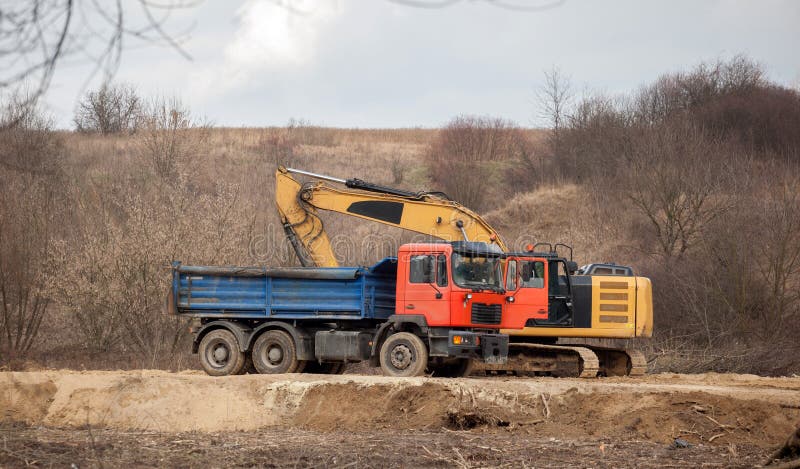 Excavator in action stock photo. Image of digger, bulldozer - 68473274