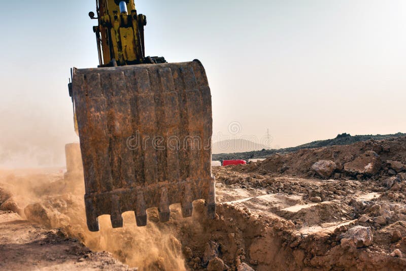 Backhoe Digging in Dust Close Up Stock Photo - Image of close, city ...