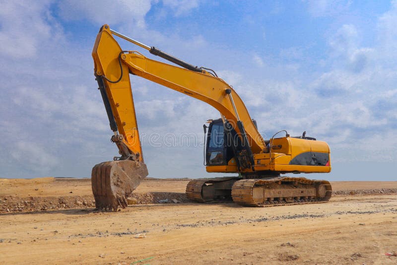 Excavator or Backhoe on Construction Site and Sky Background. Stock ...