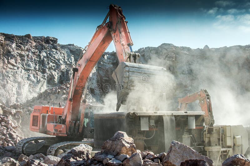 Excavator crushing rocks stock image. Image of track - 20539733