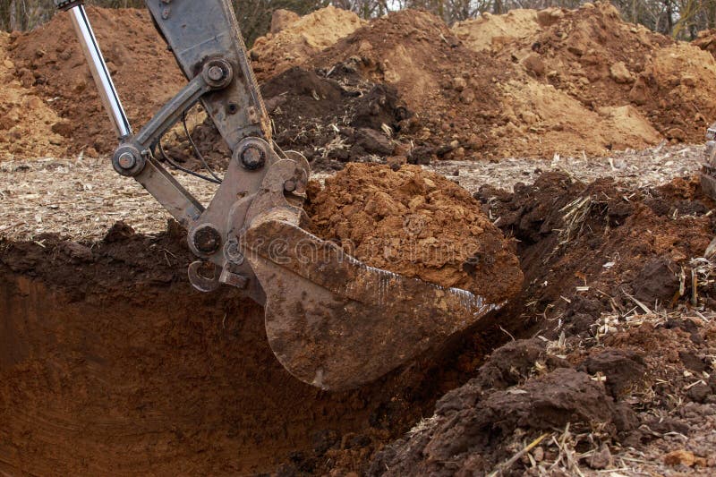 Excavator boom and bucket stock image. Image of excavation - 276219033